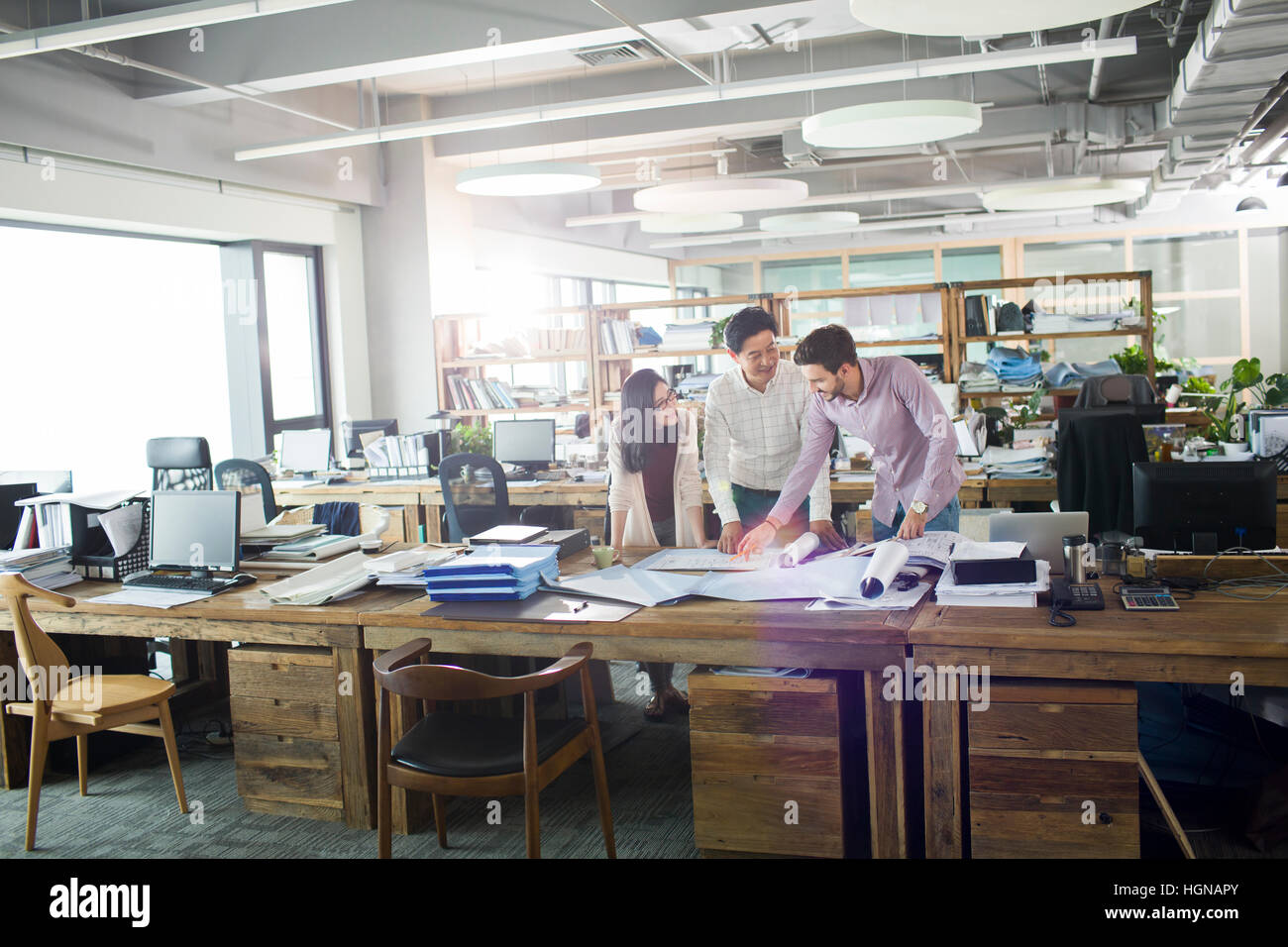 Architects working in the office Stock Photo - Alamy