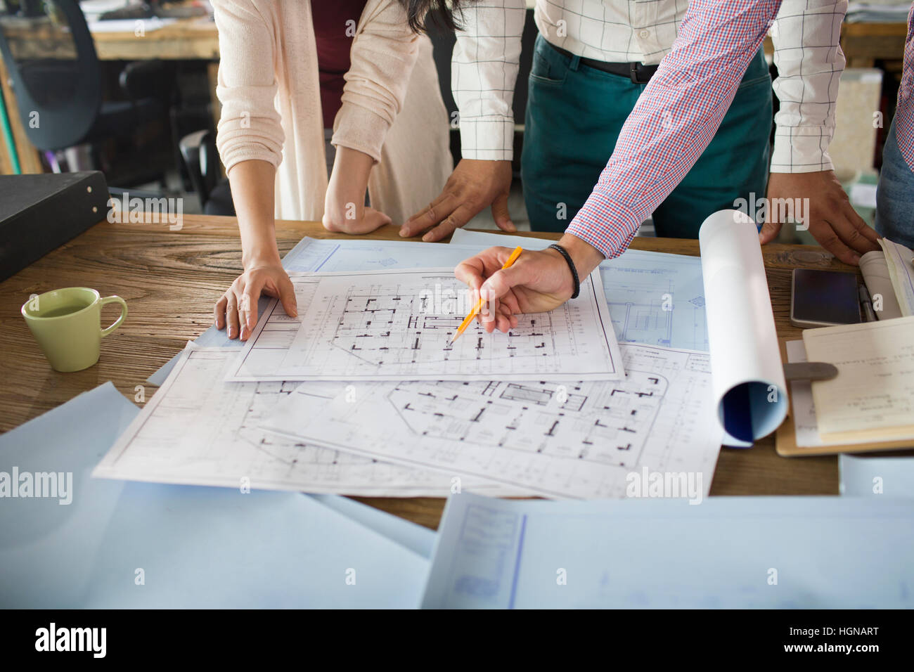 Architects working in the office Stock Photo - Alamy