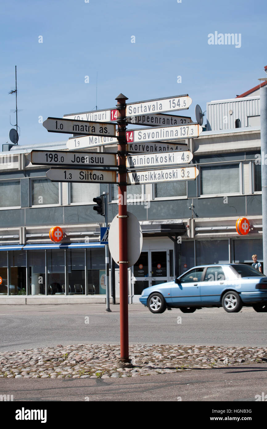 Distances sign pole, Imatra Finland Stock Photo - Alamy