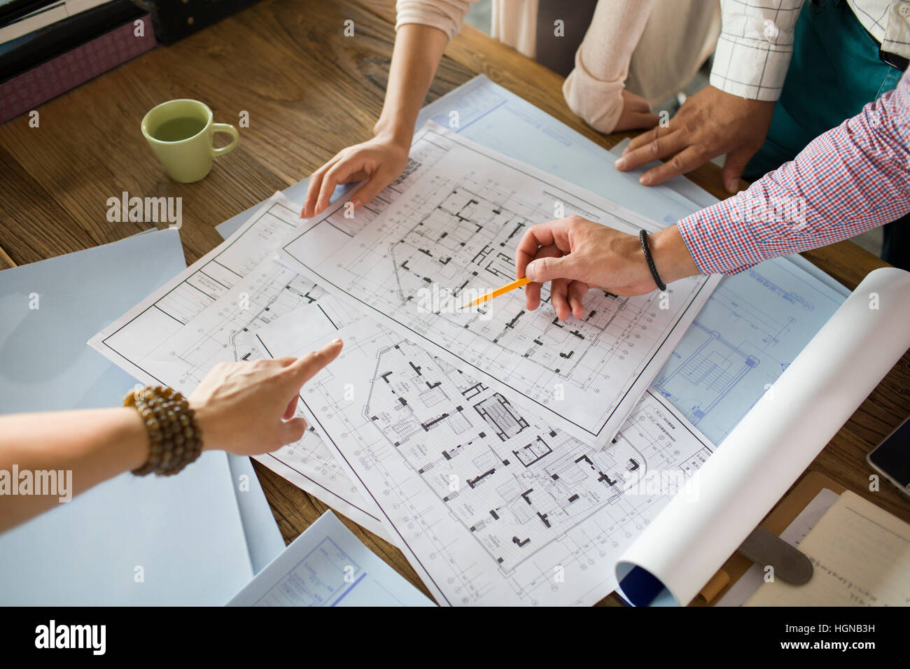 Architects working in the office Stock Photo - Alamy