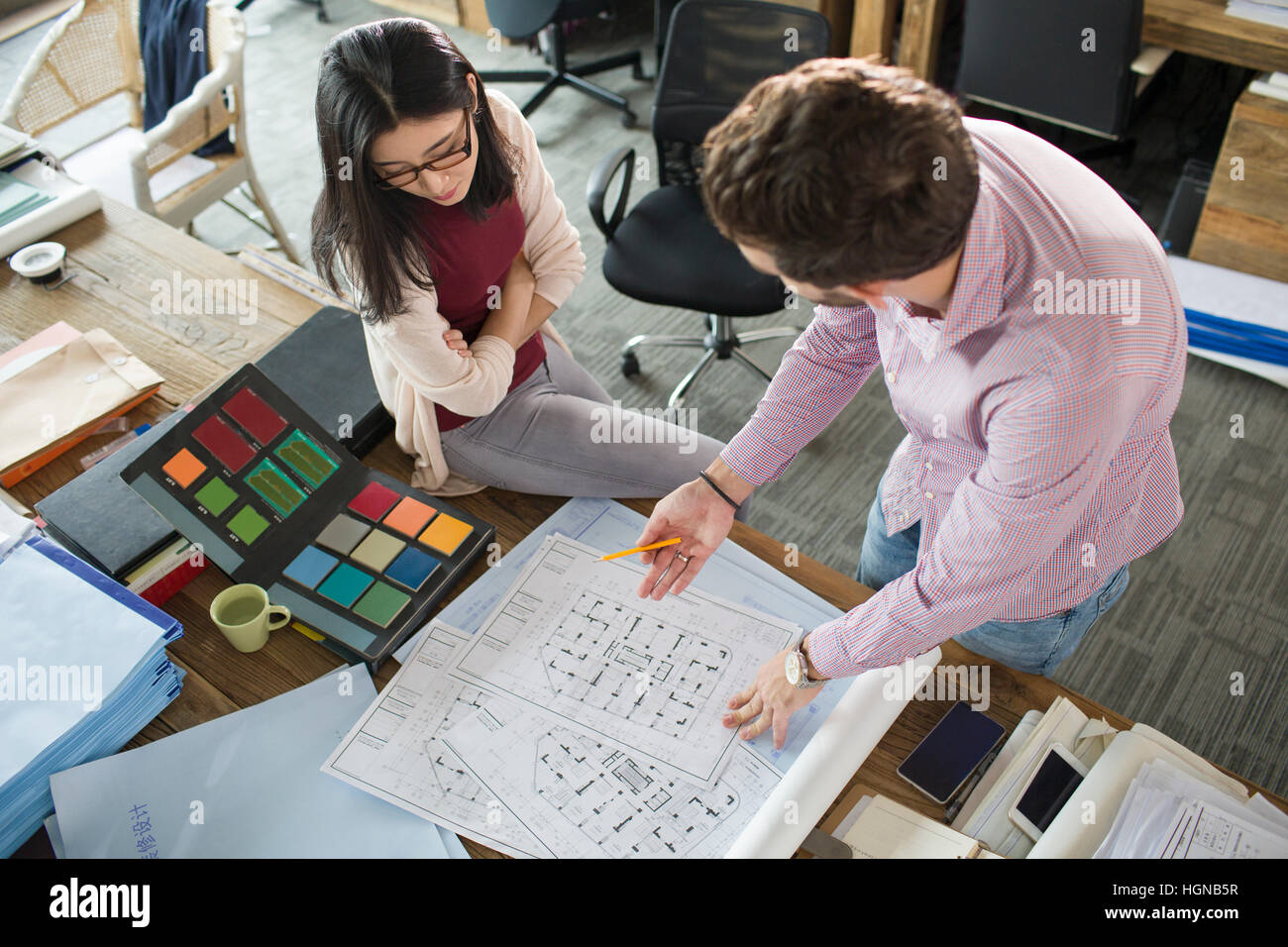 Architects working in the office Stock Photo - Alamy