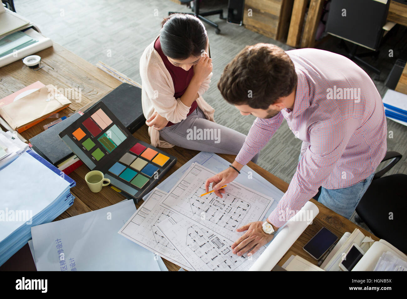 Architects working in the office Stock Photo - Alamy