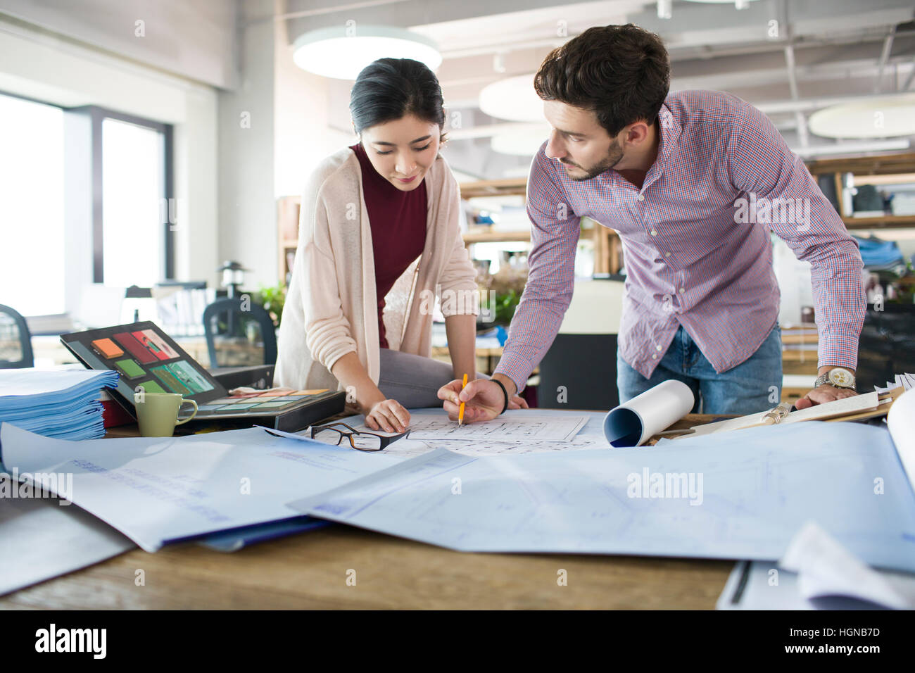 Architects working in the office Stock Photo - Alamy