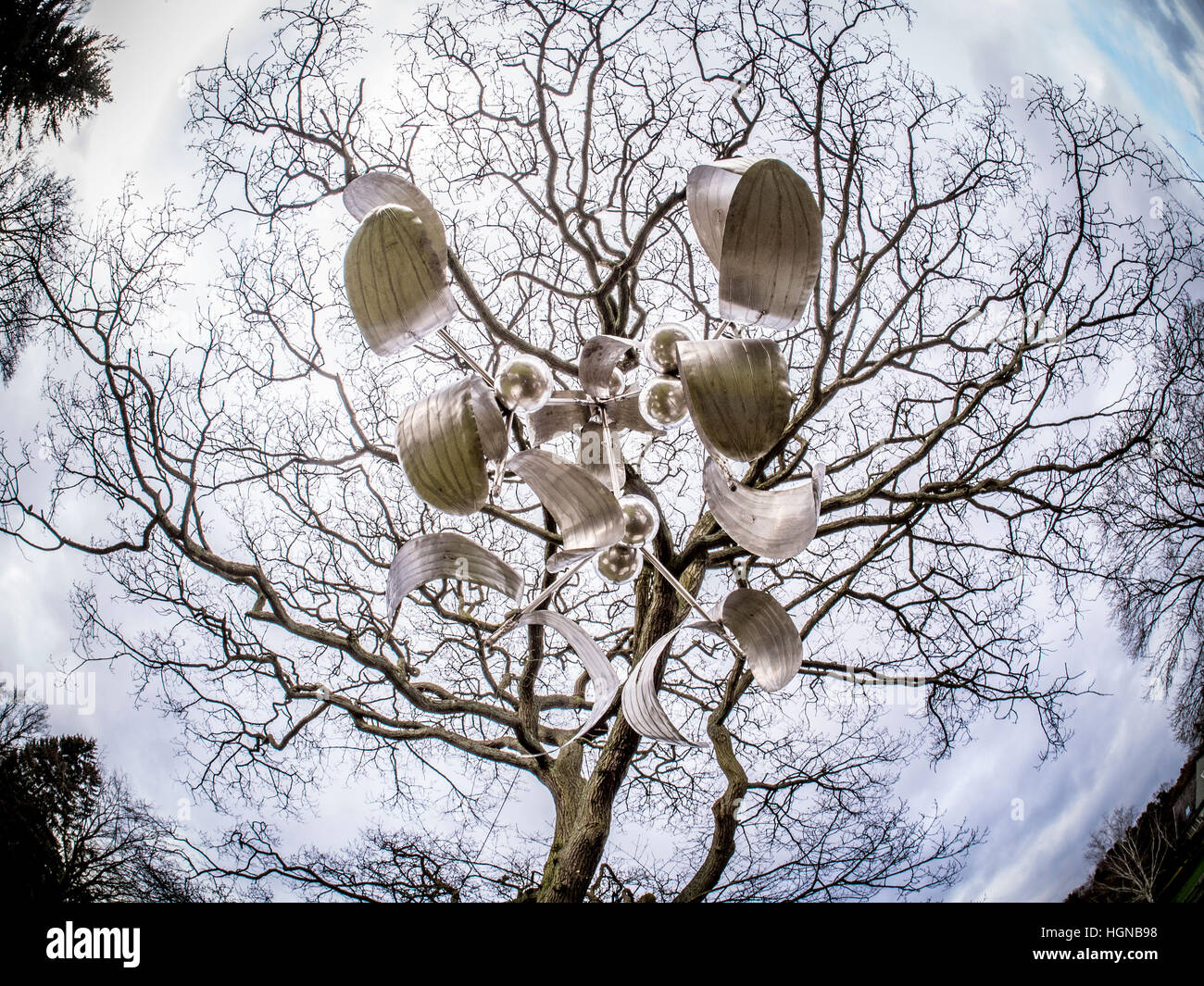 Metal Mistletoe sculpture by sculptor Steve Blaylock hanging in tree ...