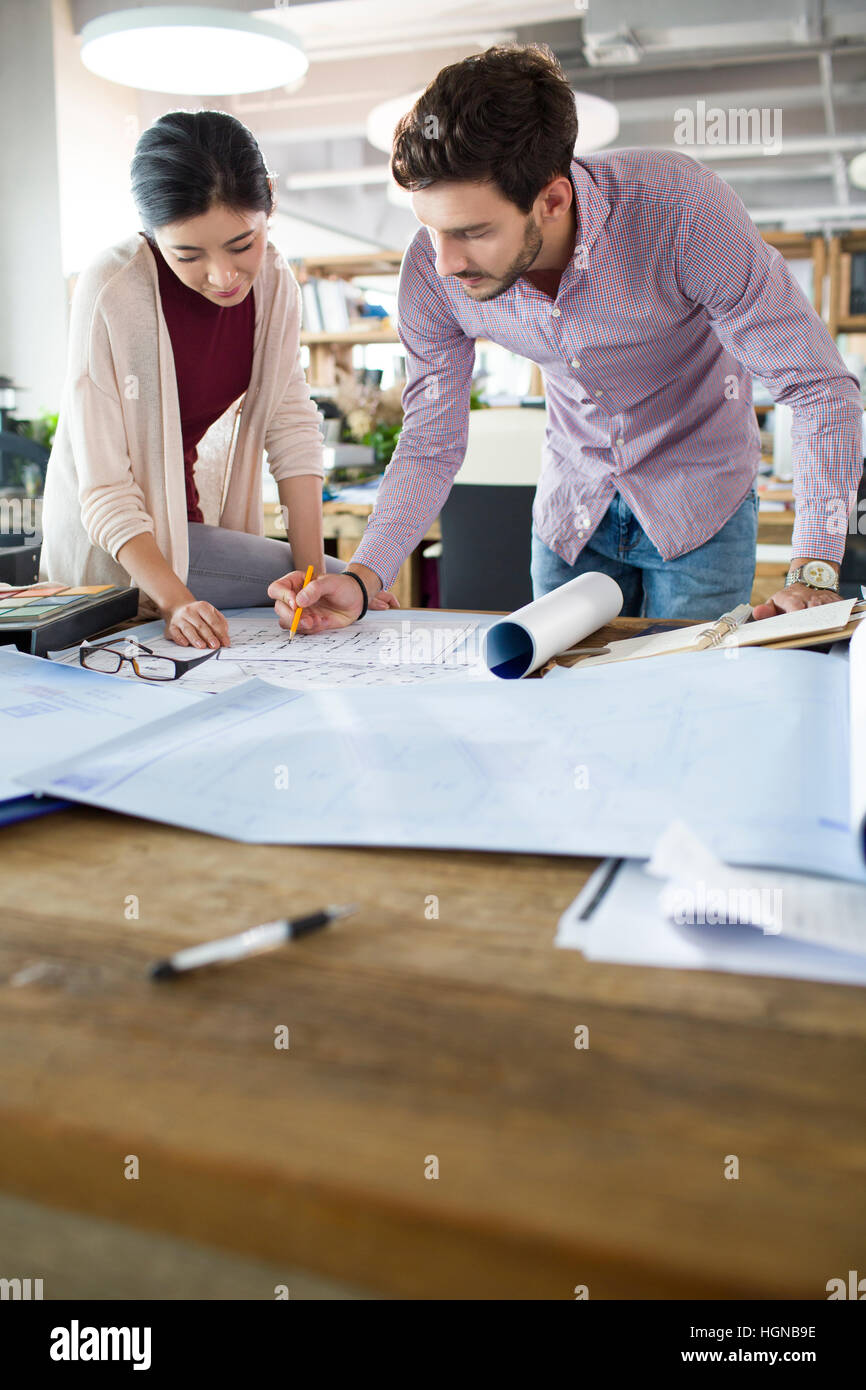 Architects working in the office Stock Photo - Alamy