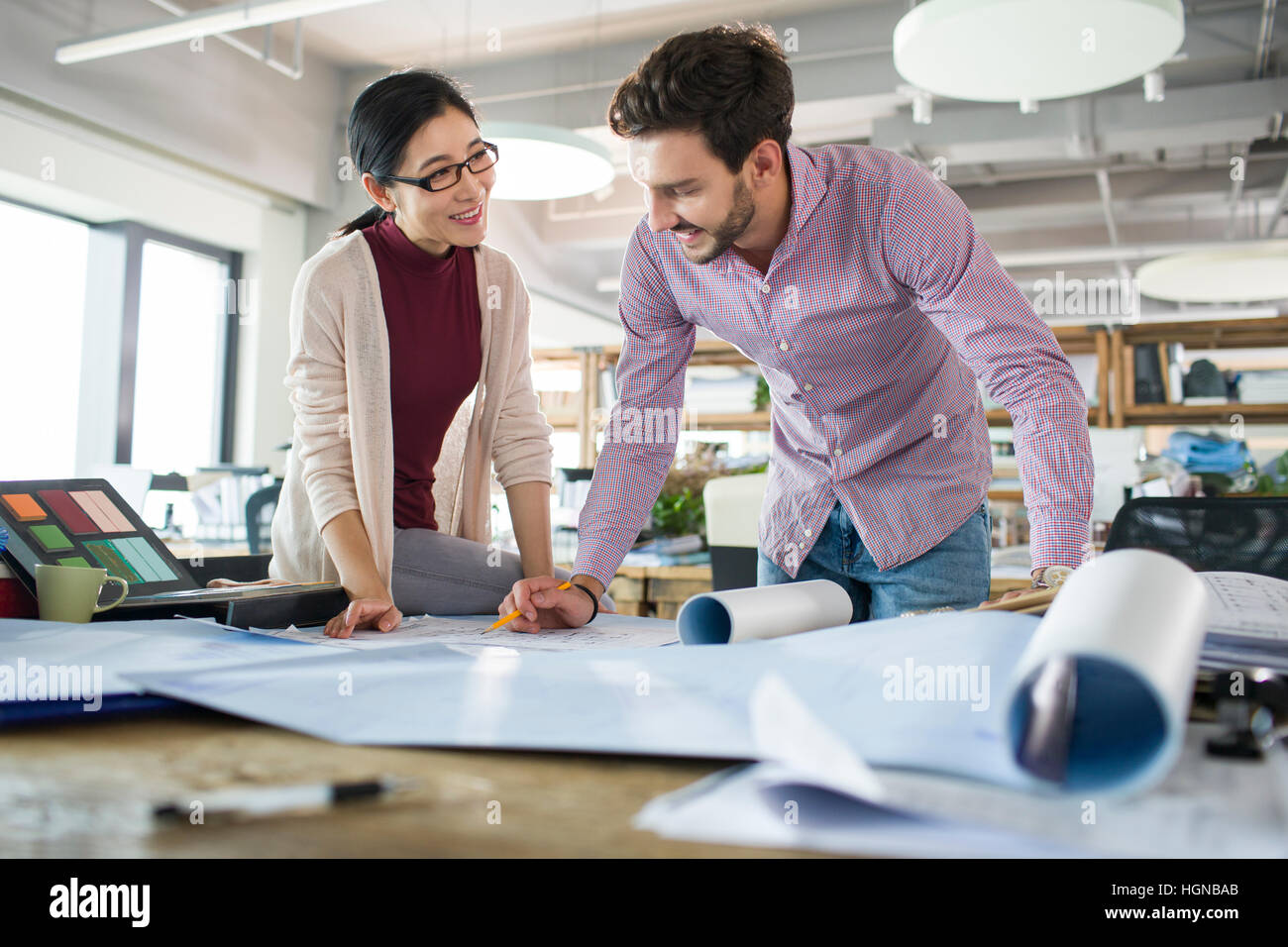 Architects working in the office Stock Photo - Alamy