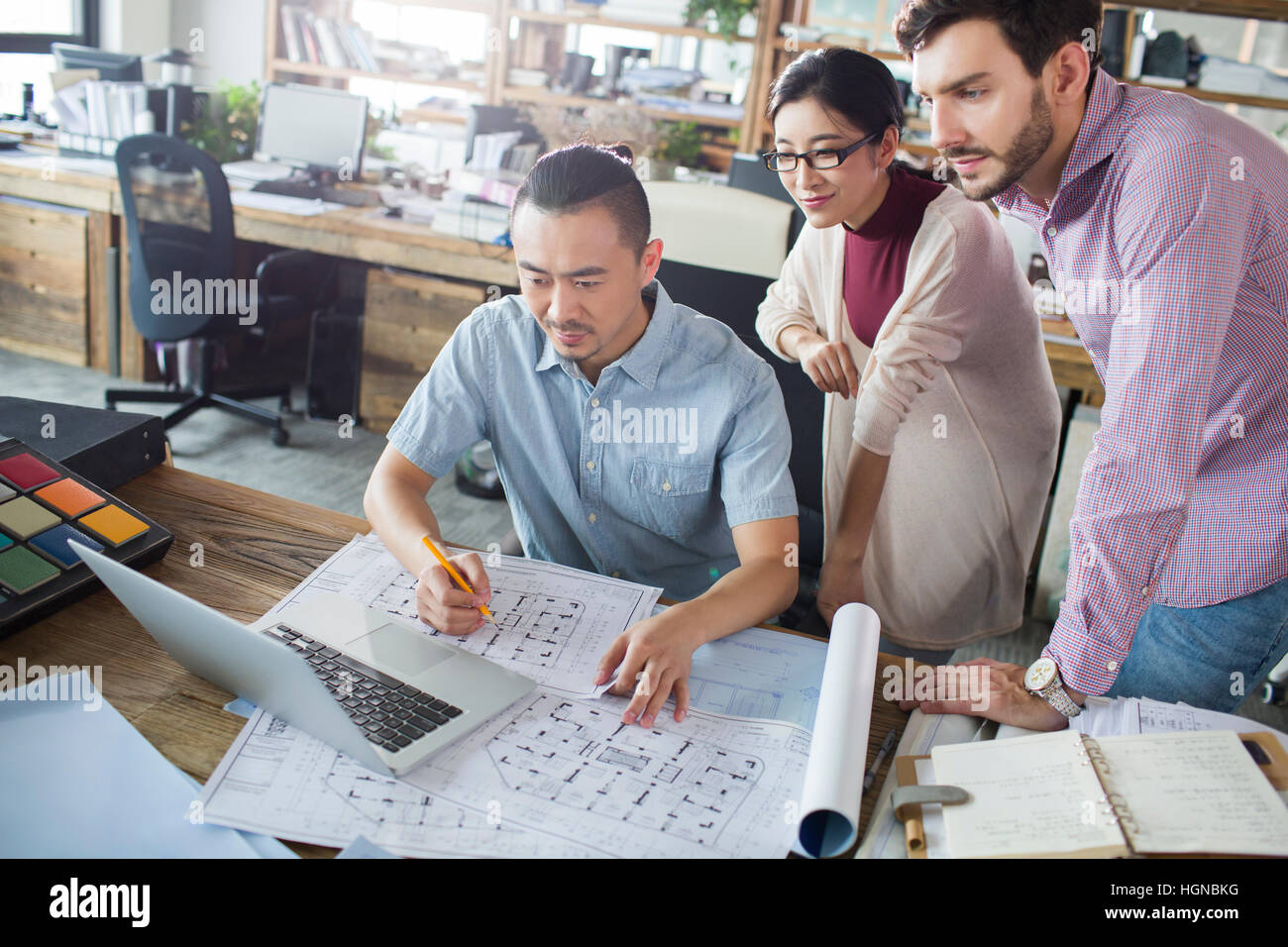 Architects working together in the office Stock Photo - Alamy