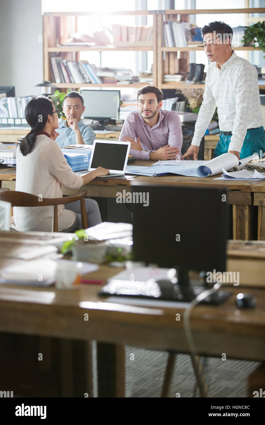 Architects talking in the office Stock Photo - Alamy