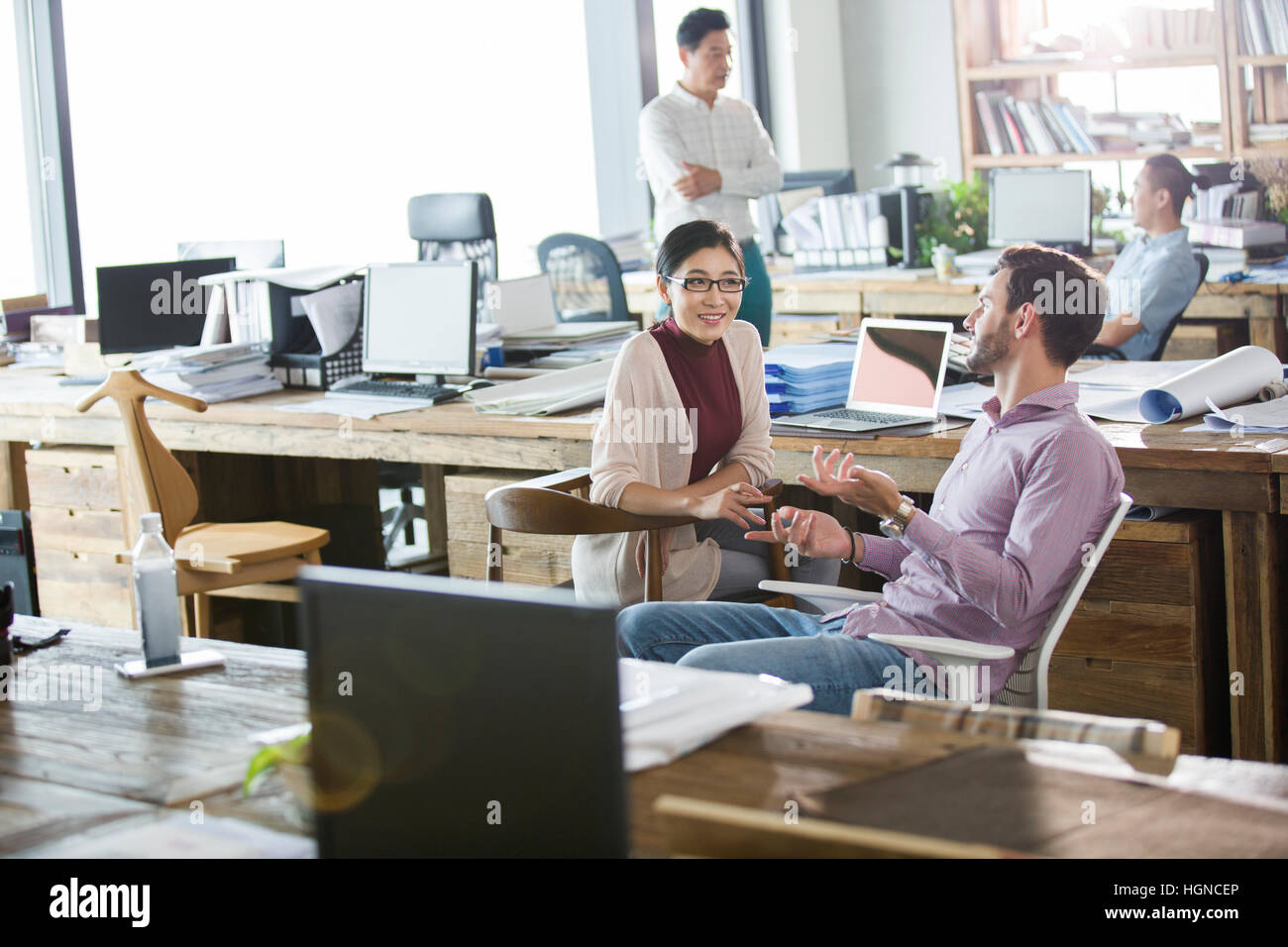 Architects talking in the office Stock Photo - Alamy
