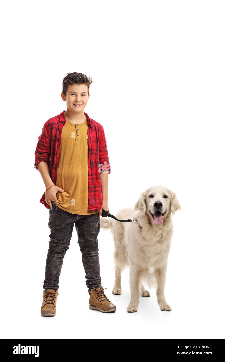 Full length portrait of a joyful little boy with a dog isolated on ...