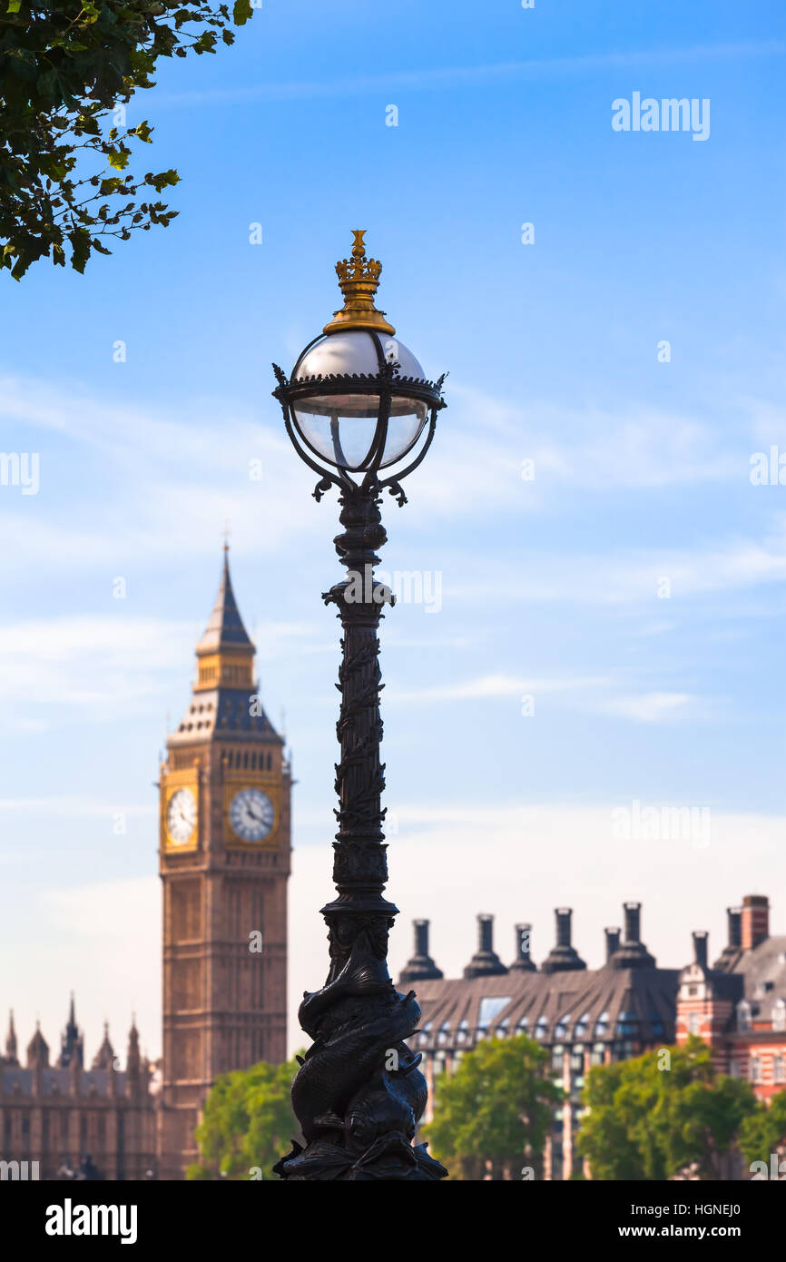 Vintage street lamp in London with Big Ben clock tower and rooftops of ...