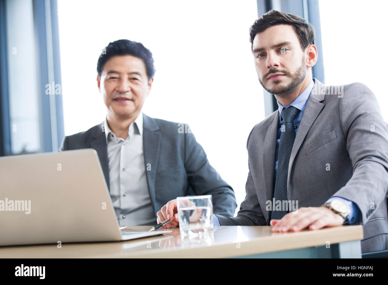 Business people talking in meeting room Stock Photo - Alamy