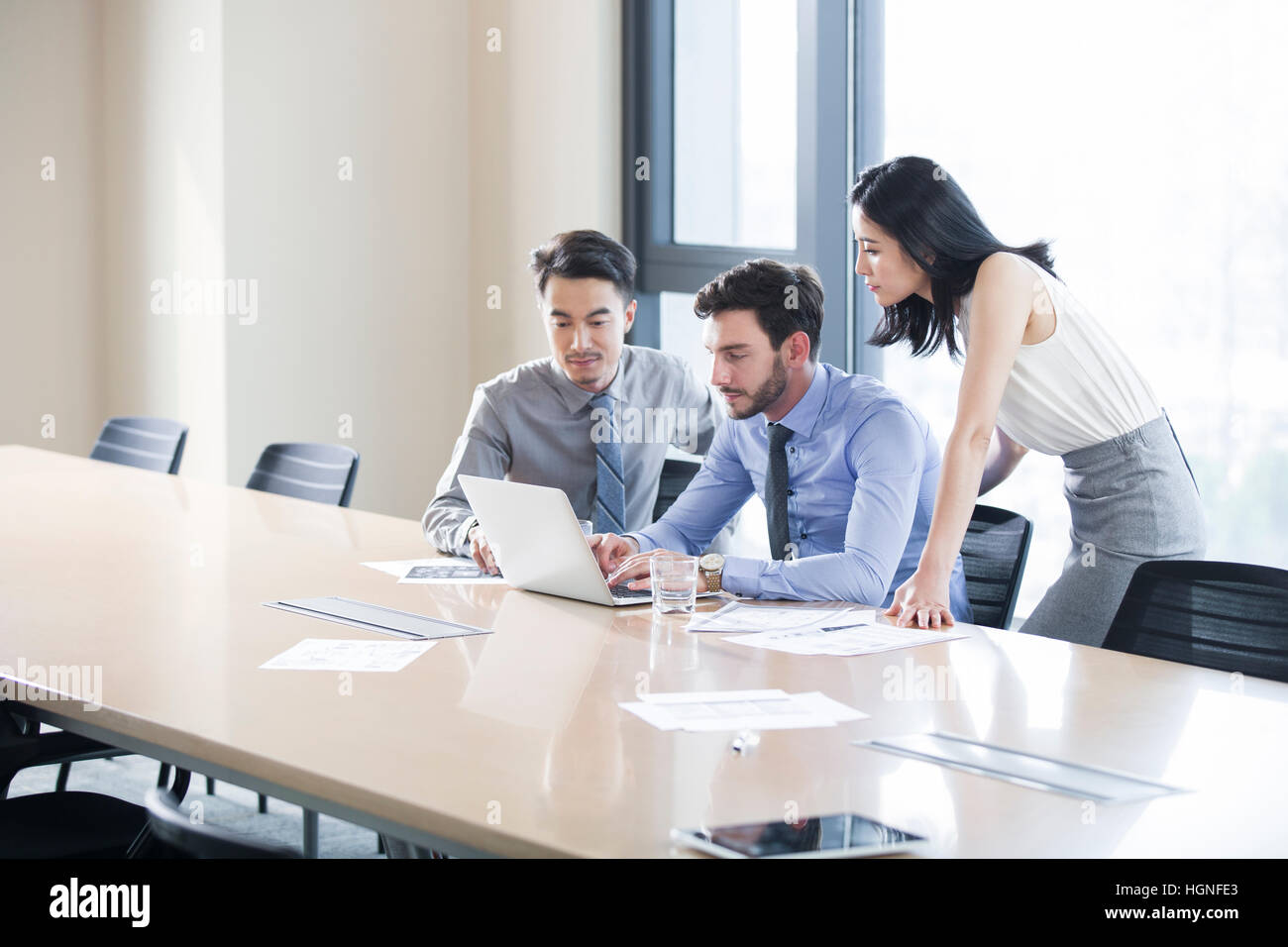 Business people talking in meeting room Stock Photo - Alamy