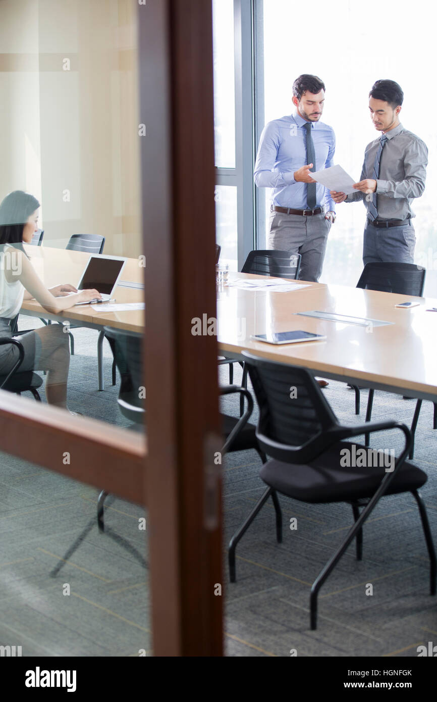 Business people talking in meeting room Stock Photo - Alamy