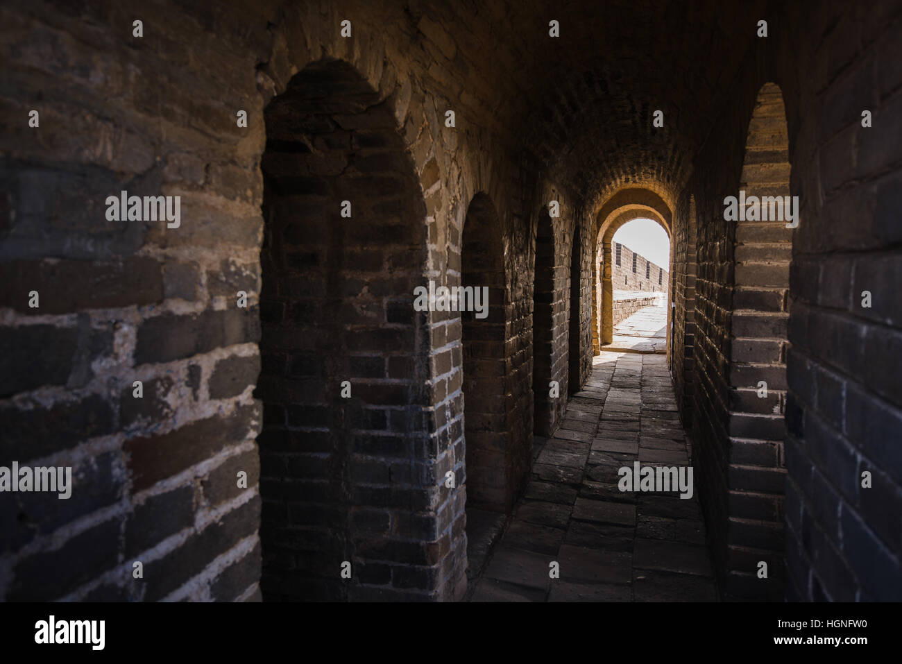long stone corridor with stairway in ancient castle or wall Stock Photo ...
