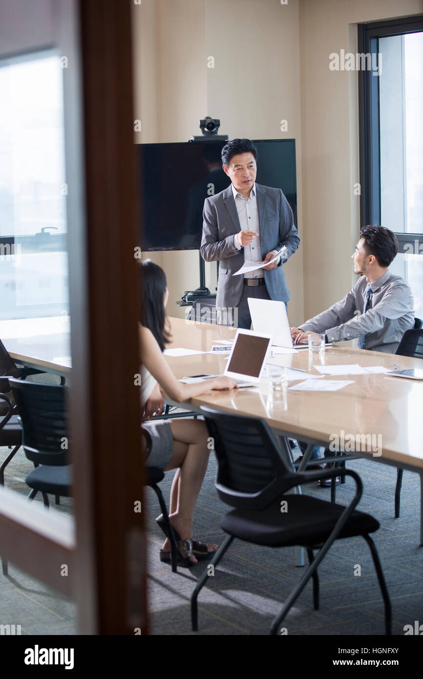 Vertical video businessman standing in hi-res stock photography and ...