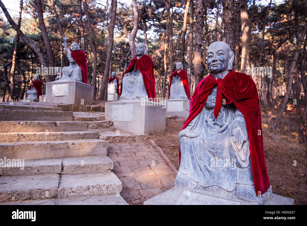 Praying Stone Monk Statues High Resolution Stock Photography and Images ...