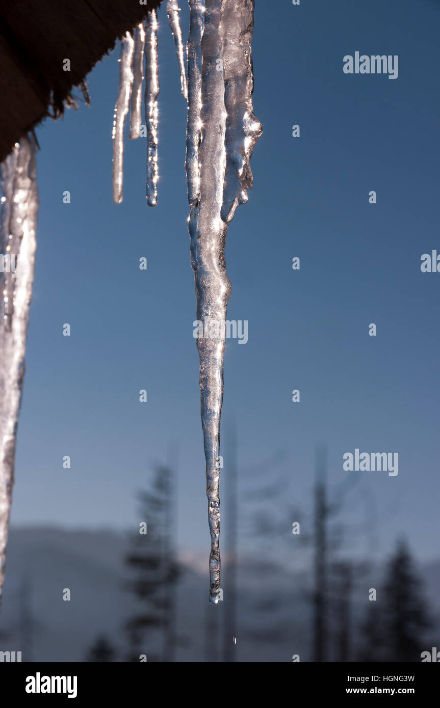 Icicles on roof of house hi-res stock photography and images - Alamy