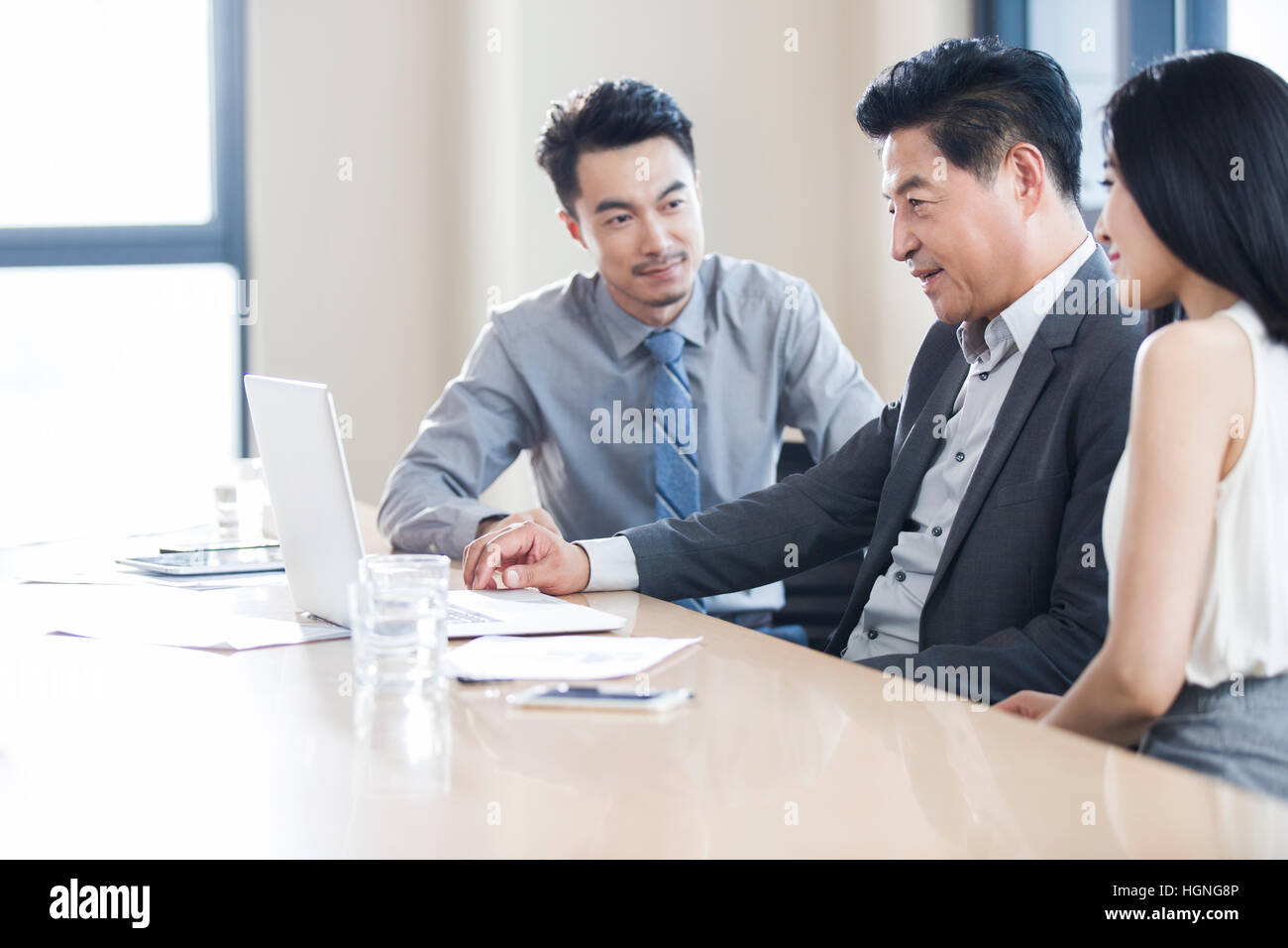 Side by side conference table manager confidence teamwork office ...