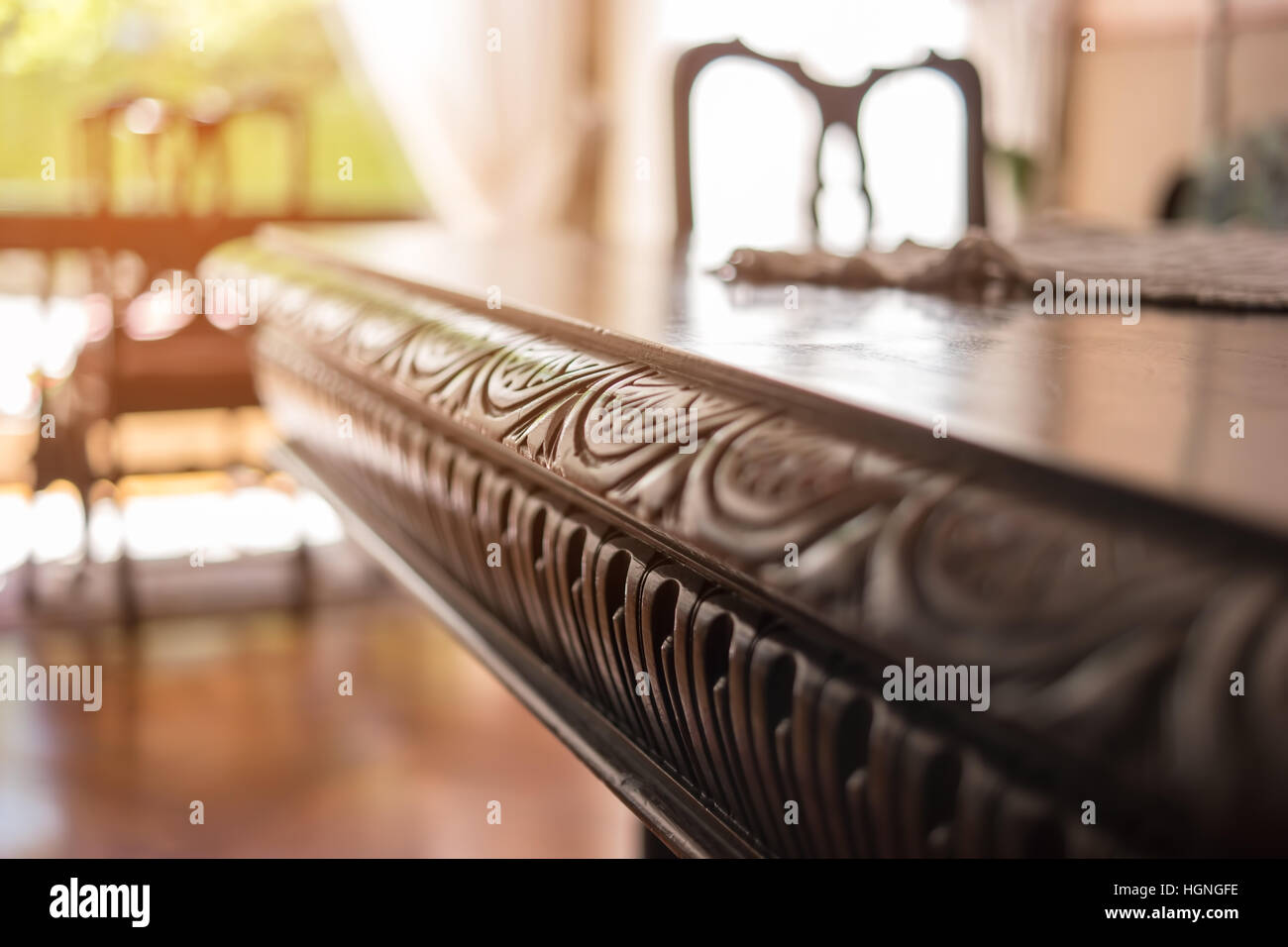 Classic wood table and sunlight Stock Photo - Alamy