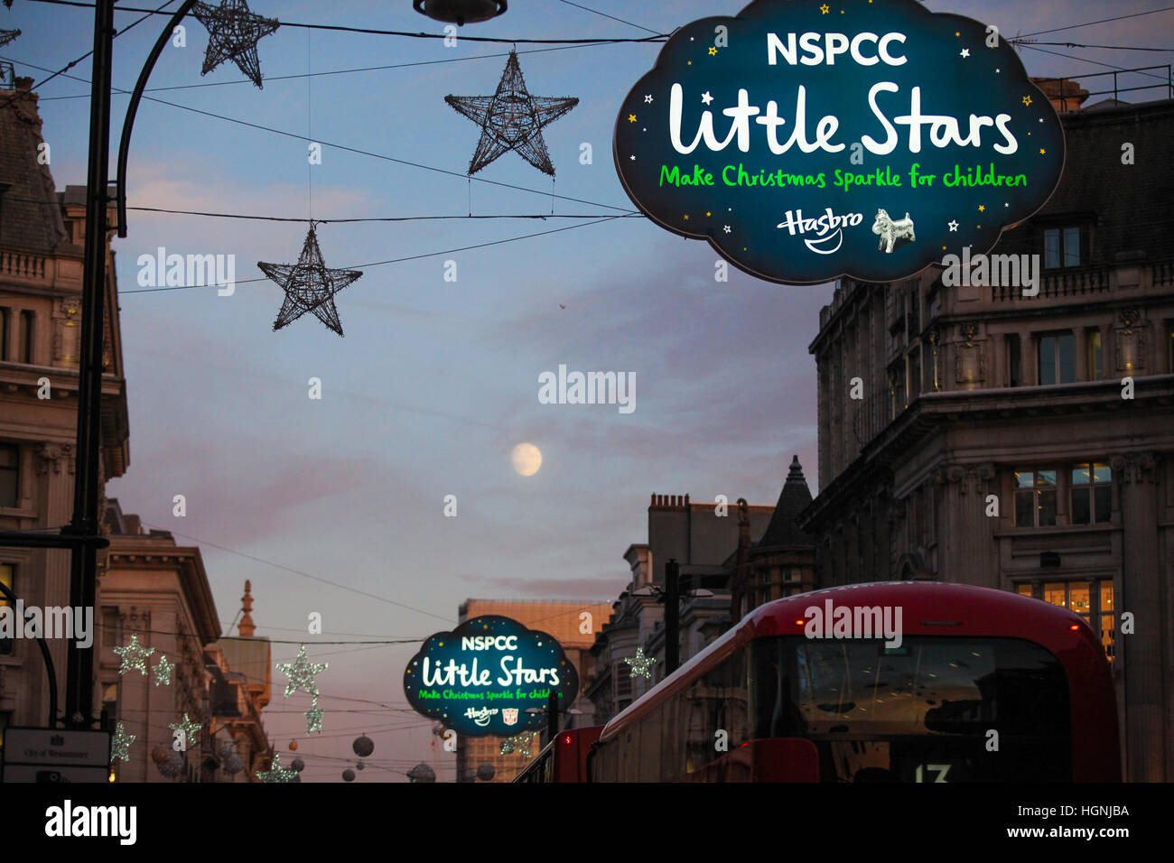 The moon, the star and Christmas lights over Oxford Street, London, at ...