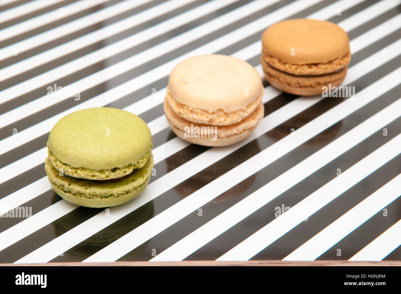 Macaroons close up on a pink background, selection of macaroons Stock ...