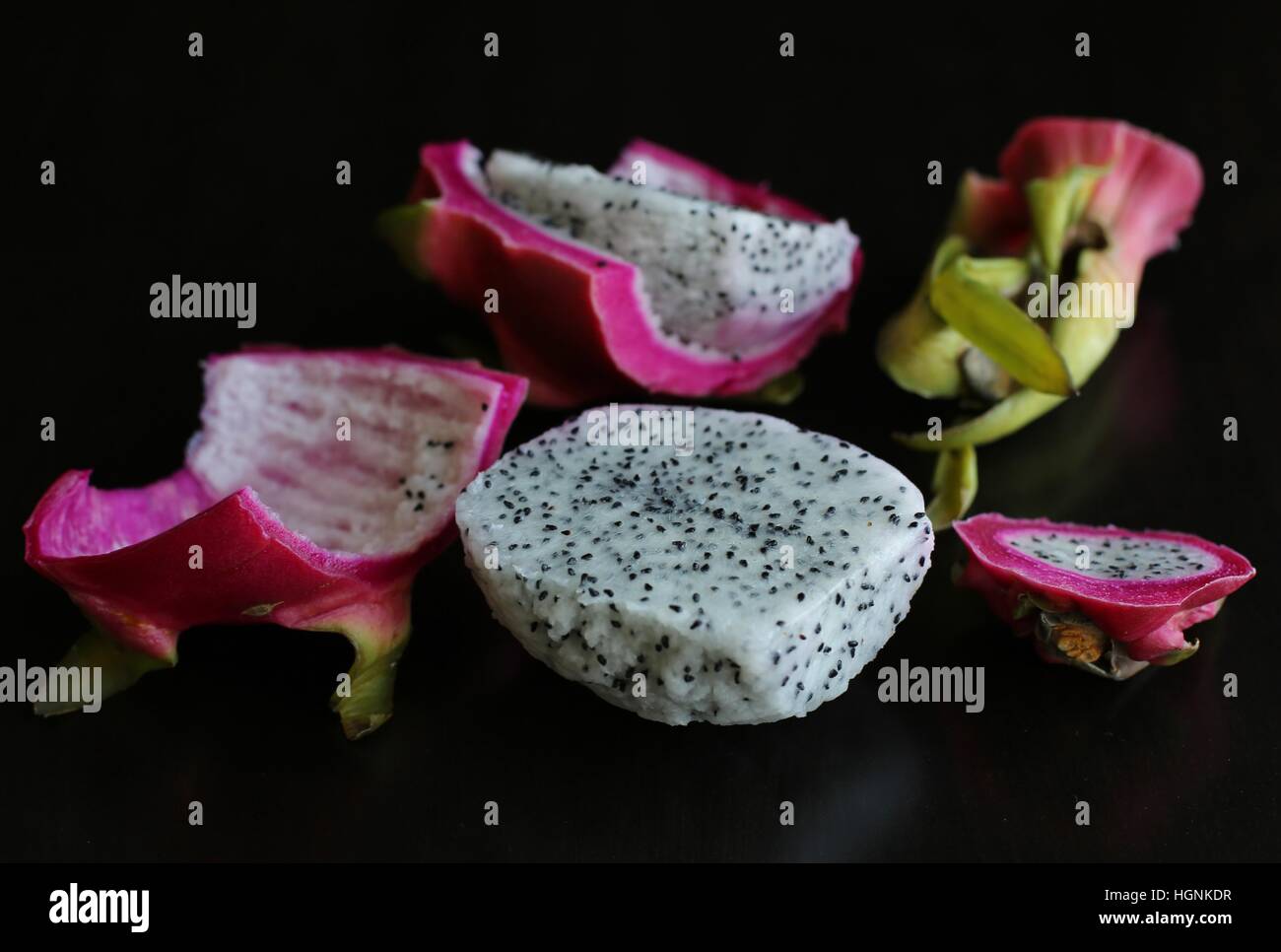 The various parts of a dragon fruit that has been cut open Stock Photo ...