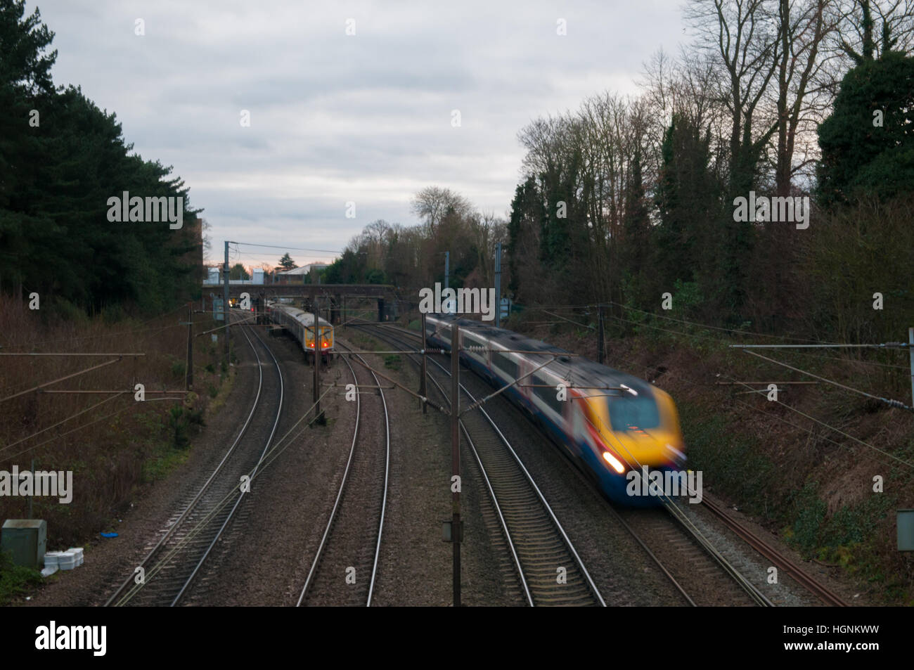 Trains on a railway line Stock Photo - Alamy