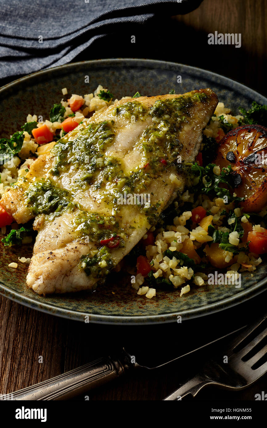 Sea bream and cauliflower rice Stock Photo - Alamy