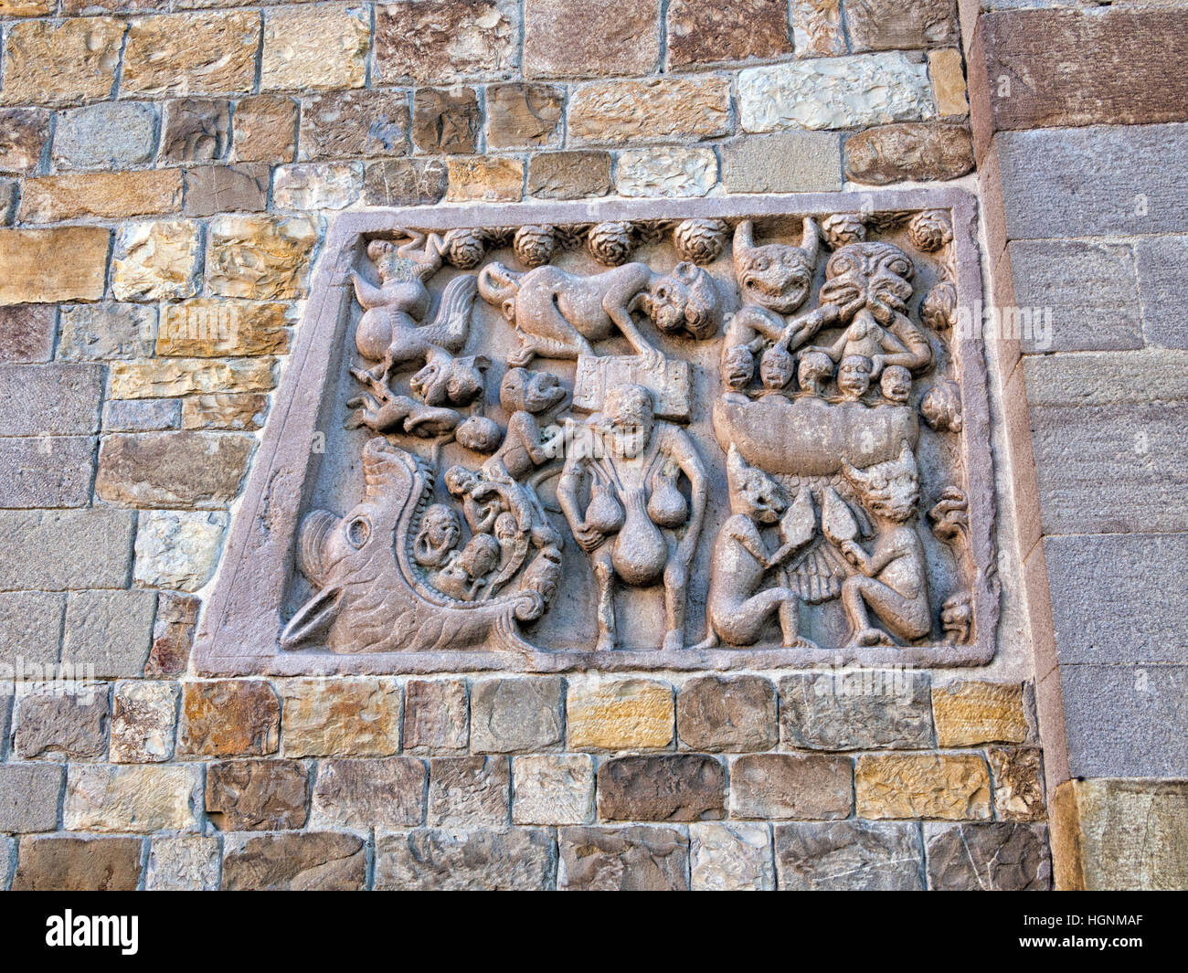 Stone carving of hell,seven deadly sins outside church Santa Maria ...