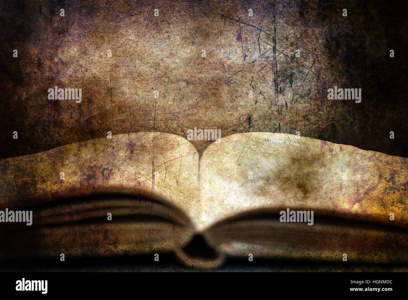 Open book against grunge background Stock Photo - Alamy