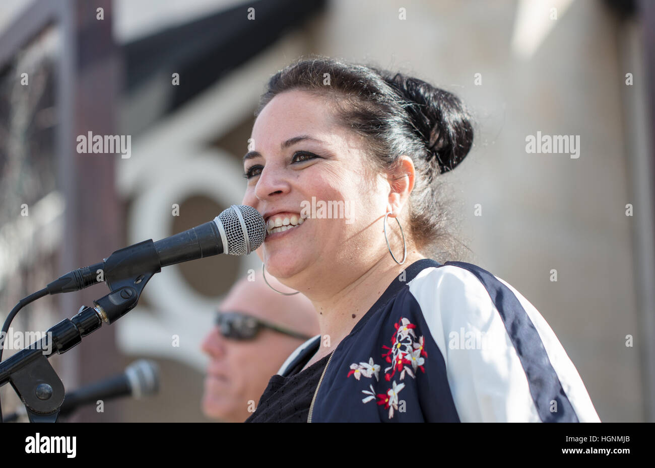 Music Duo singing and playing guitar at an outdoor venue Stock Photo ...