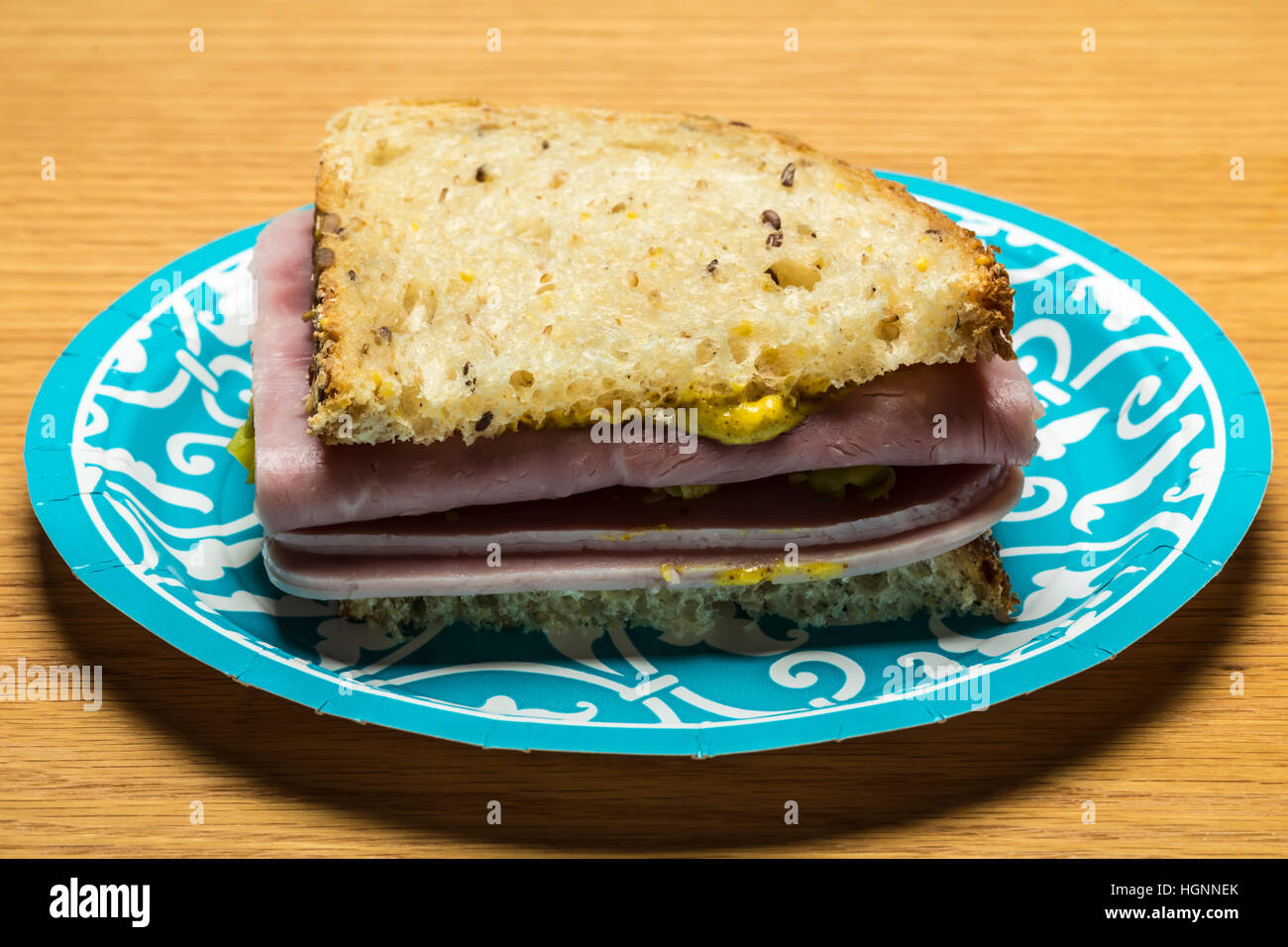 ham sandwich on paper plate on wooden table Stock Photo - Alamy