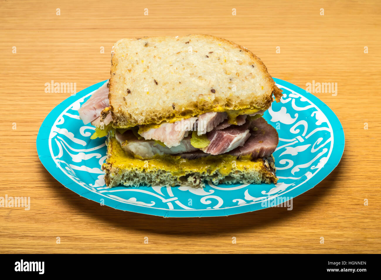 ham sandwich on paper plate on wooden table Stock Photo - Alamy