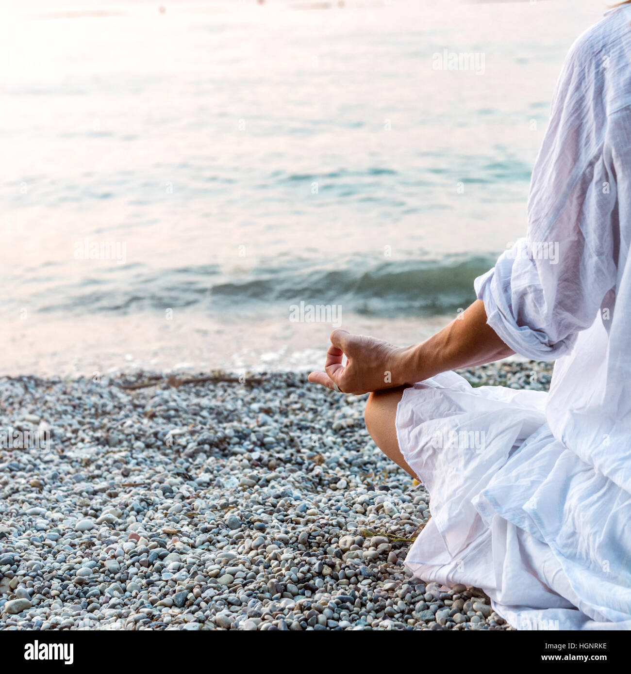 serenity and yoga practicing at the sea Stock Photo - Alamy
