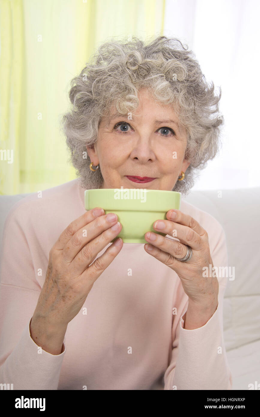 Old lady eating breakfast hi-res stock photography and images - Alamy