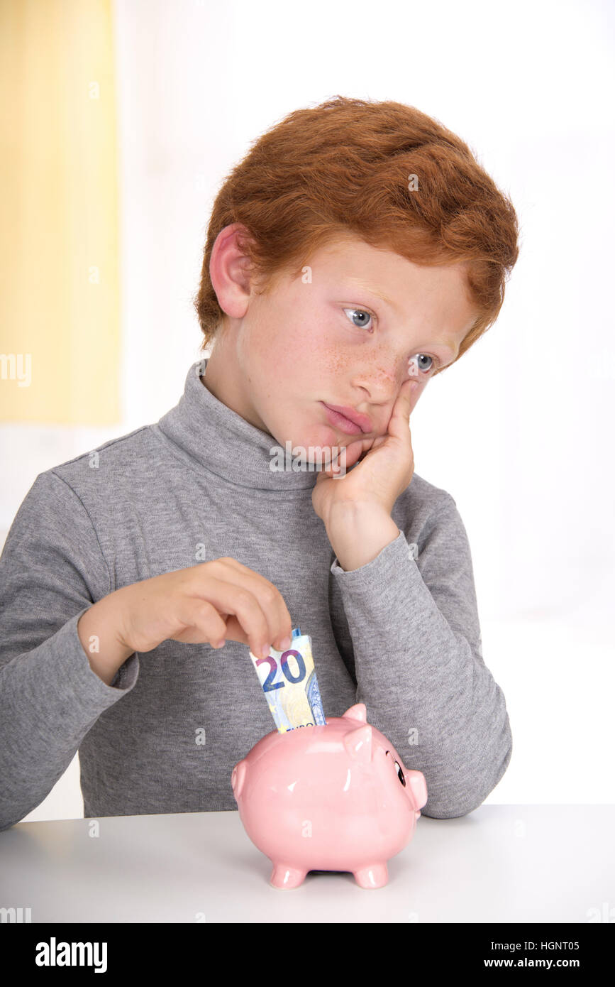 CHILD WITH MONEY Stock Photo - Alamy