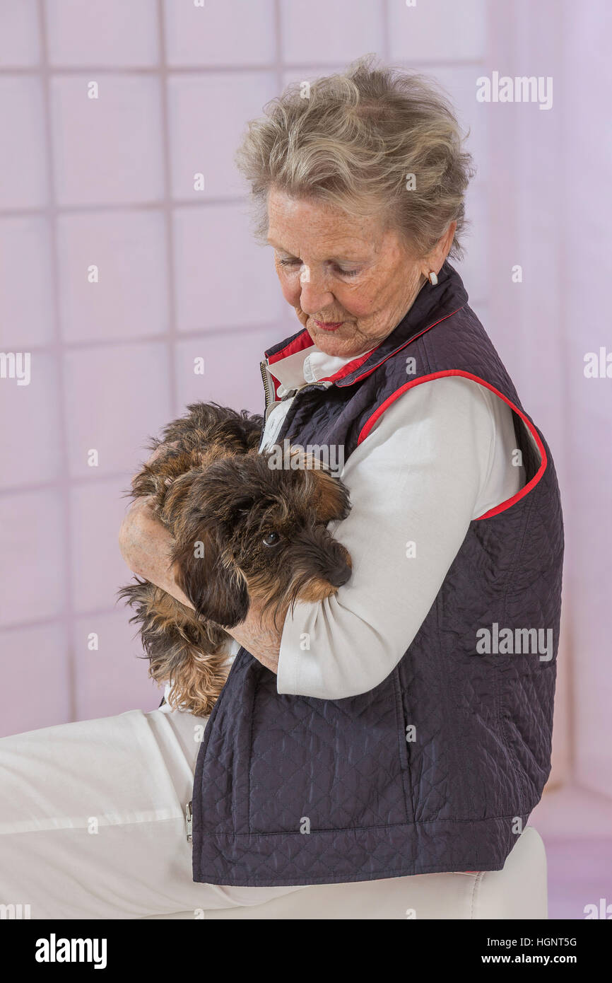 SENIOR WITH ANIMAL Stock Photo - Alamy