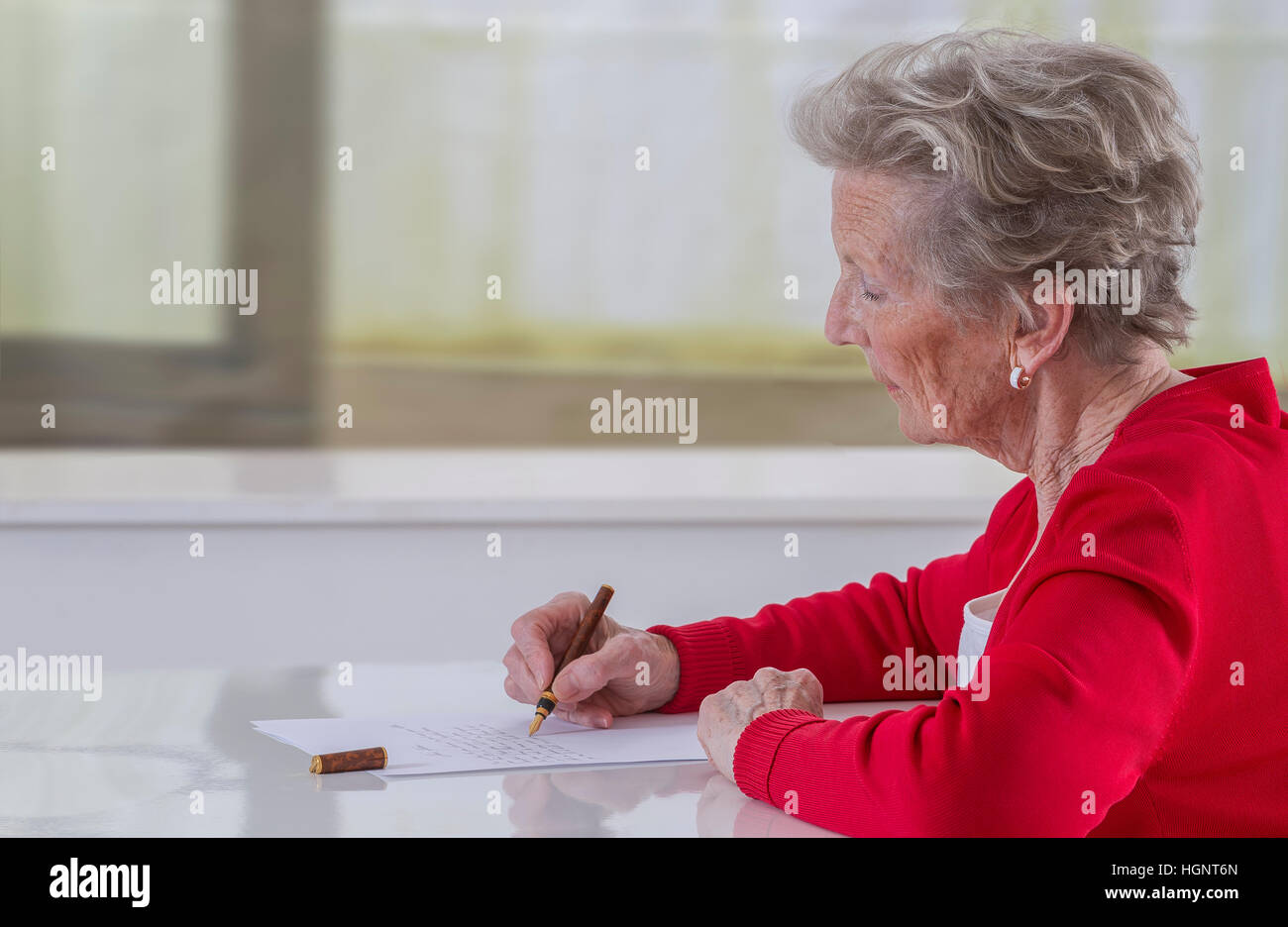 Elderly writing letter hi-res stock photography and images - Alamy