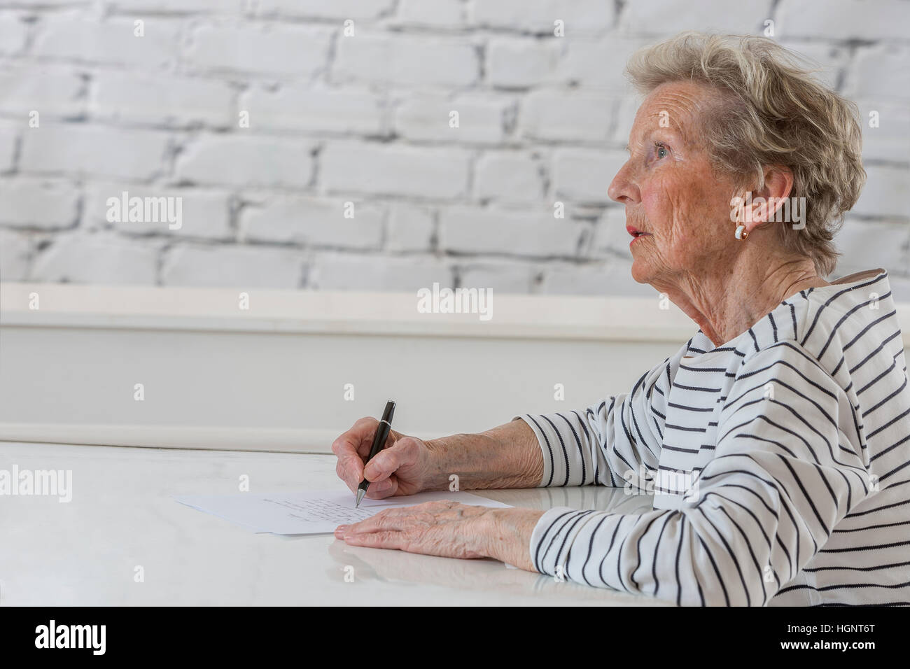 Elderly writing letter hi-res stock photography and images - Alamy