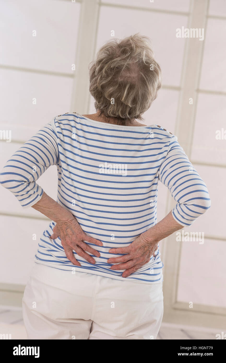 Lower back pain rear view woman hi-res stock photography and images - Alamy