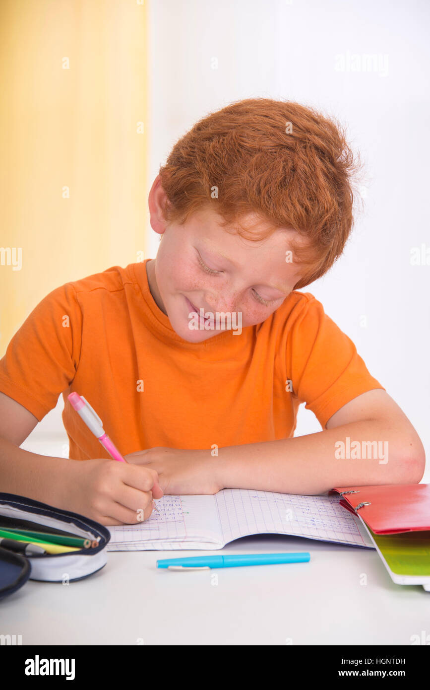 CHILD DOING HOMEWORK Stock Photo - Alamy