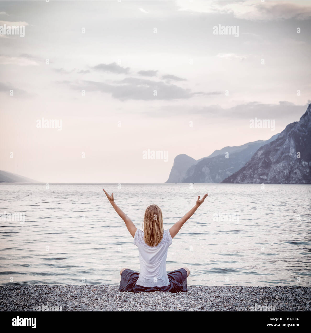 serenity and yoga practicing at the lake Garda Stock Photo - Alamy