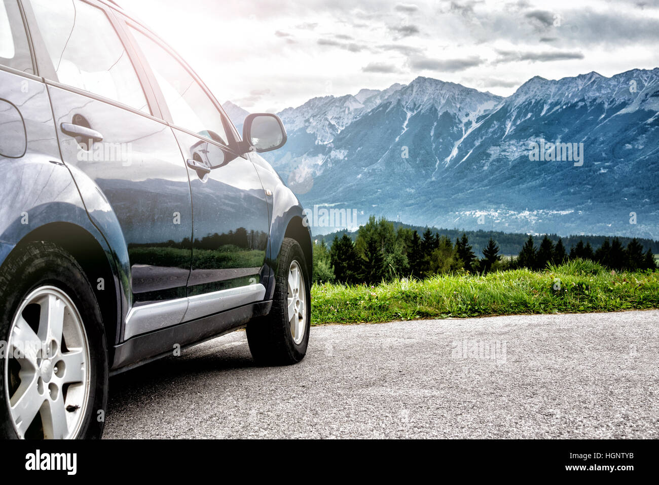 car for traveling with a mountain road Stock Photo - Alamy