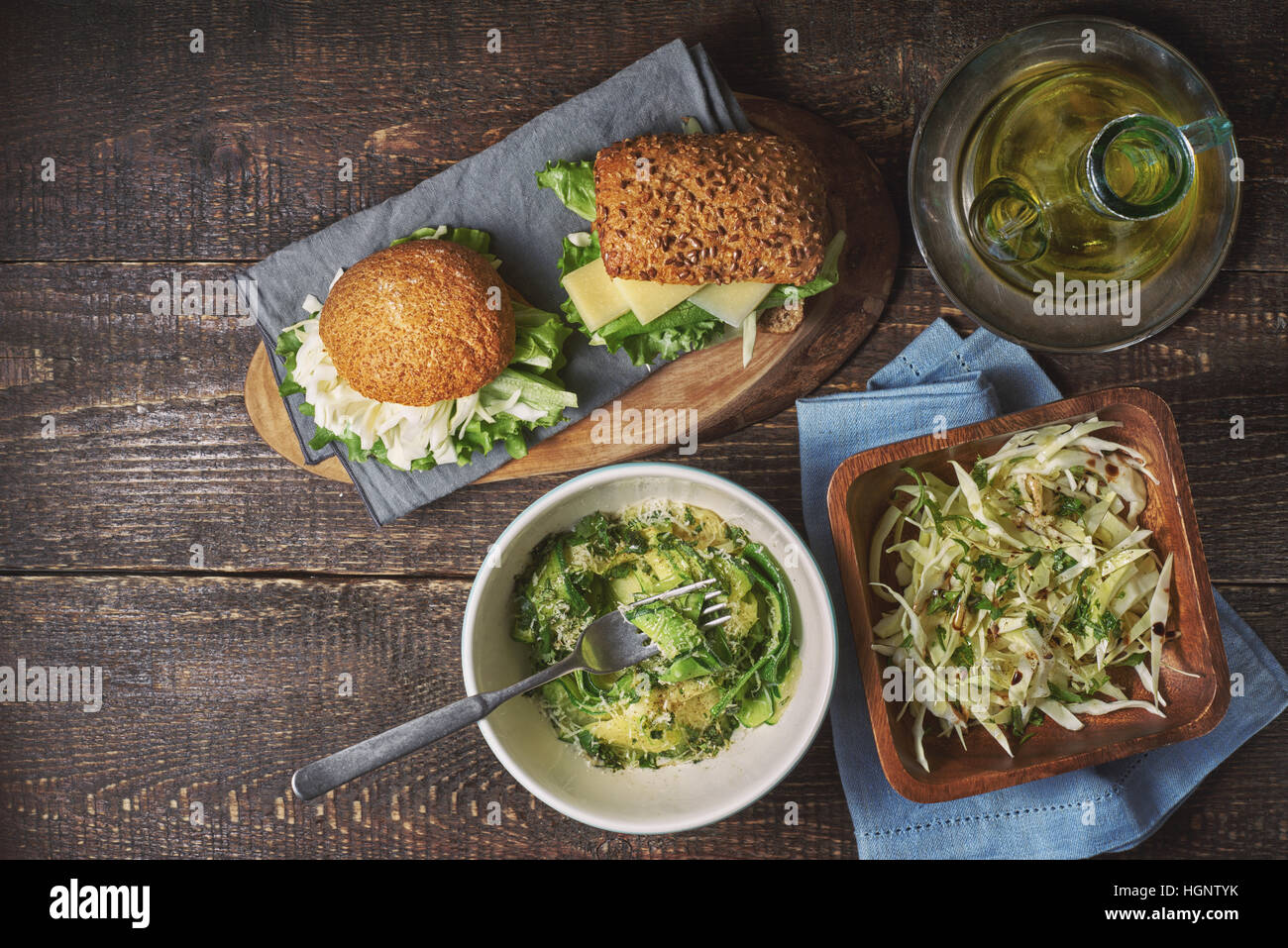 Different healthy snacks on the wooden table top view Stock Photo - Alamy