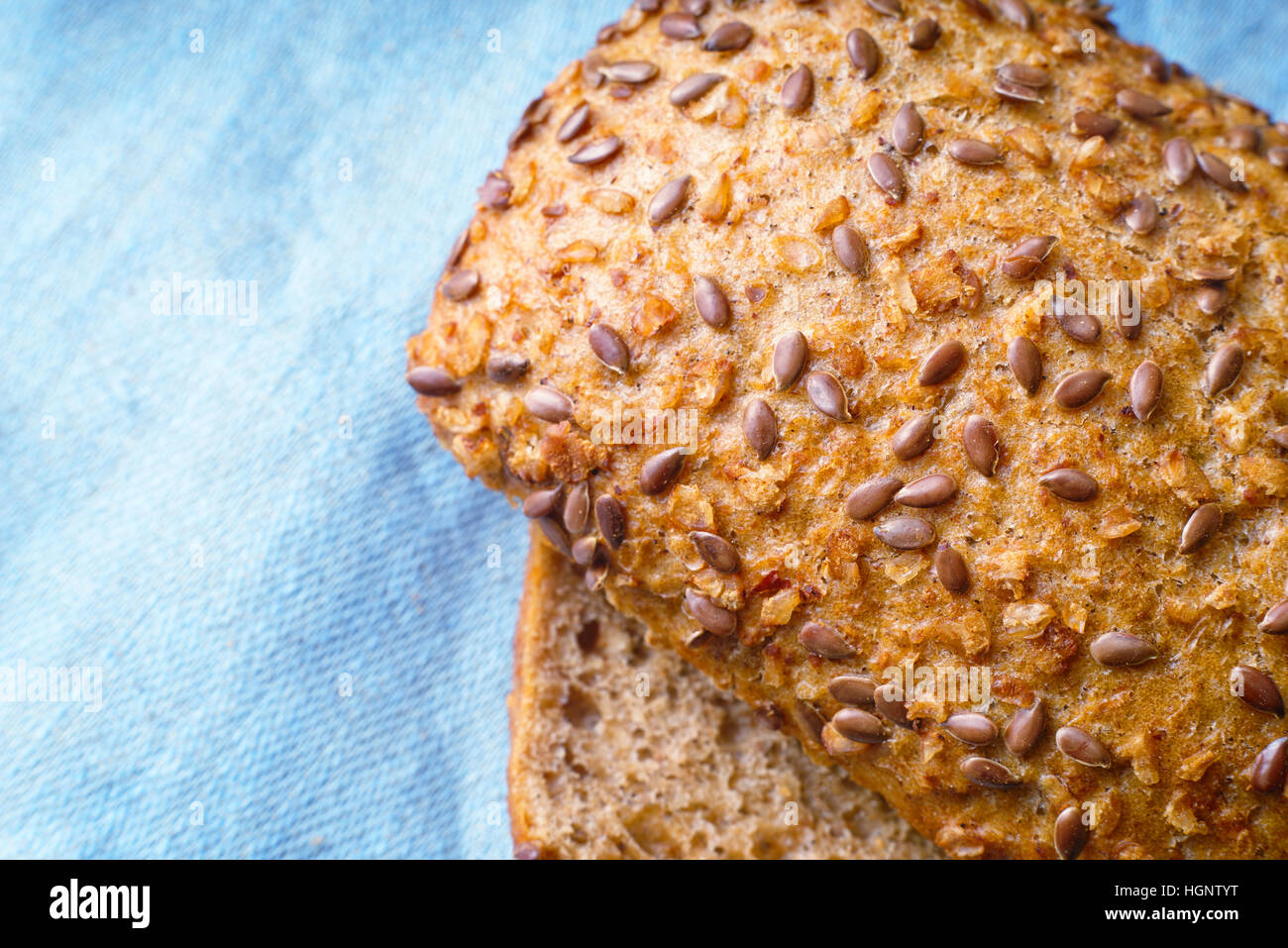 Wholegrain bread on the blue cloth top view Stock Photo - Alamy