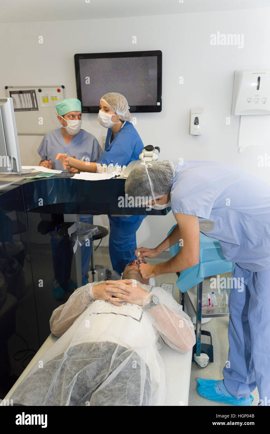 Mature male eye surgery hi-res stock photography and images - Alamy