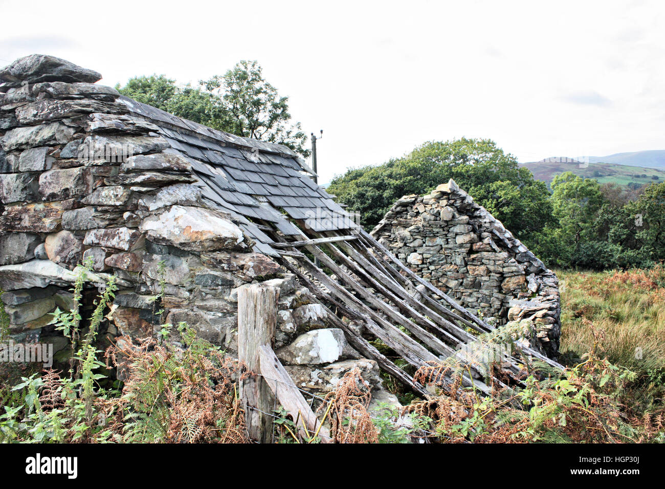 Derelict stone building with a broken roof Stock Photo - Alamy