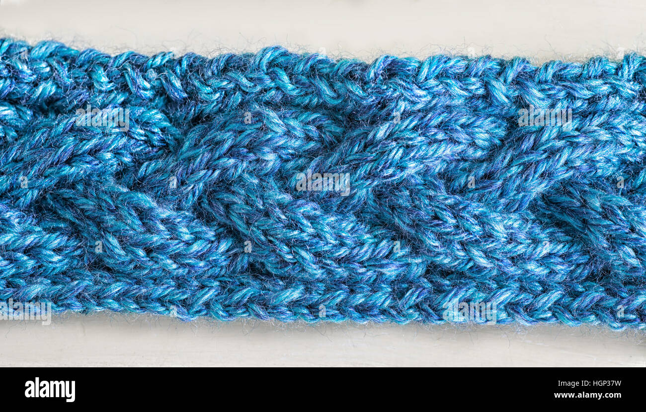 Hand knitted piece of cable fabric Stock Photo - Alamy