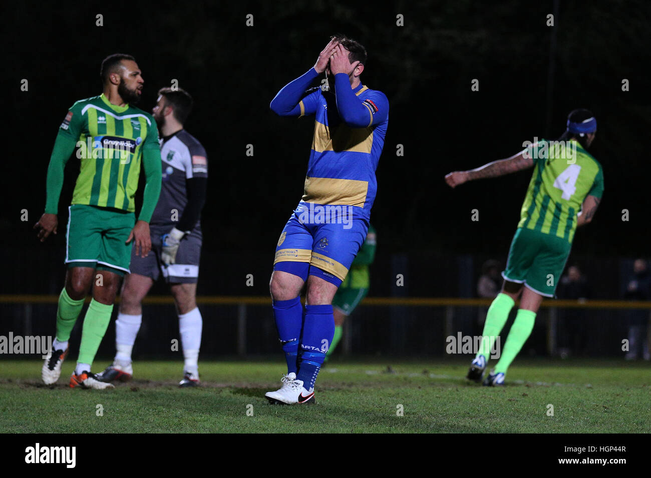 Nick Reynolds of Romford reacts as a chance goes begging during Romford ...